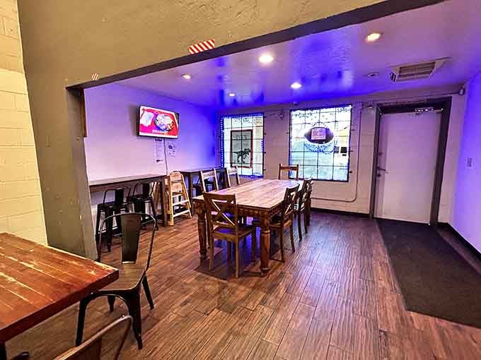 Blue ambient lighting and stained glass windows give this no-frills dining room more personality than most places twice its size.