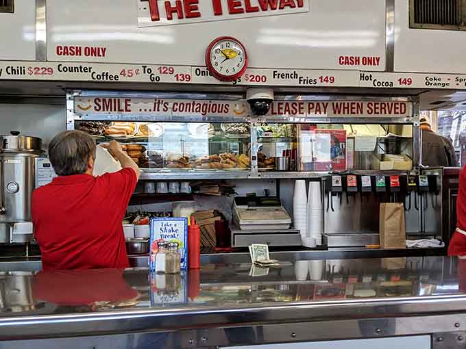 Staff in red, moving with quiet confidence. At Telway, everyone knows exactly what they're doing and why.