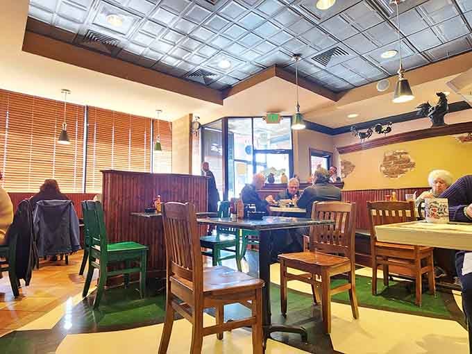Morning light streaming through the windows while regulars settle in. The tin ceiling glows and the coffee flows.