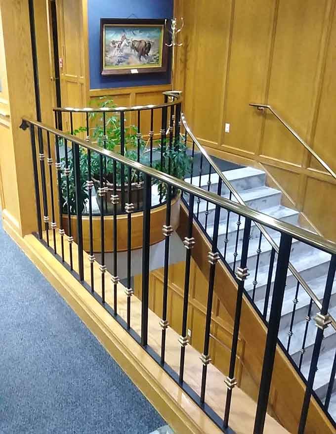 Staircases elegant enough to make descending with an armload of books feel like a grand entrance.