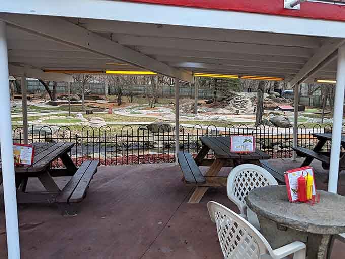 Covered picnic tables with a front-row view of the mini golf course, now that's dinner and a show.