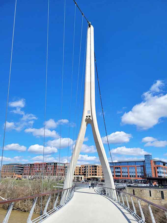 That soaring white pylon reaches skyward with the confidence of a structure that knows it's photogenic.