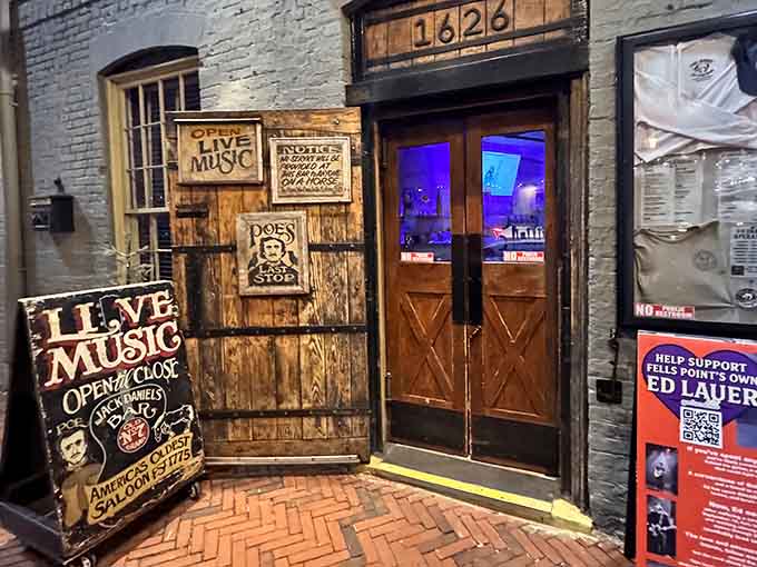 The entrance beckons with wooden doors and live music signs, promising an evening of entertainment and excellent eats.