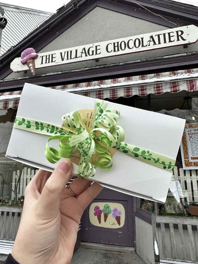 Gift boxes wrapped with botanical ribbons that elevate chocolate-giving to an art form.