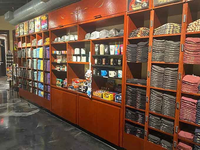 Hats, tees, mugs, and more, The Wicked Wheel's merch wall lets you take the whole experience home with you.