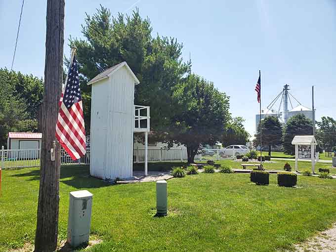Two flags, one outhouse, and a whole lot of small-town pride packed into one surprisingly moving scene.