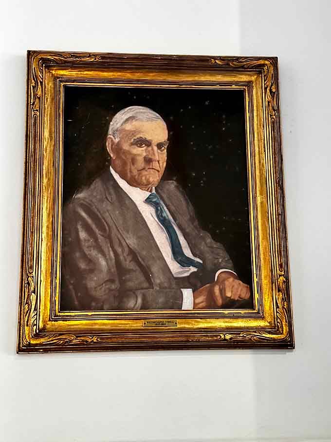Historical portraits remind visitors that real people built this community, one decision and one day at a time.