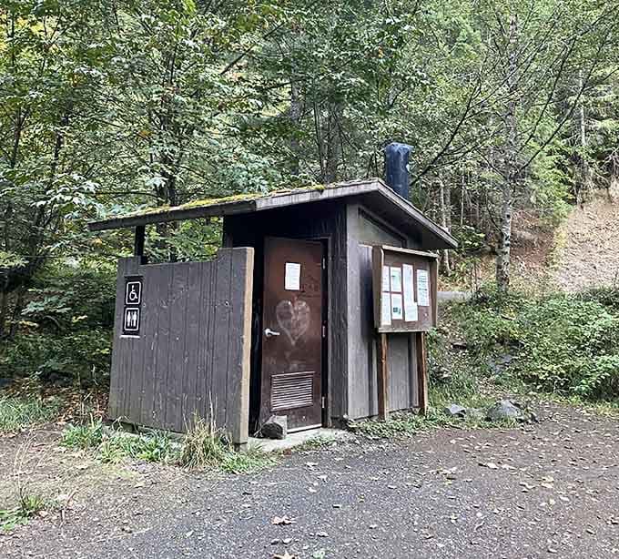 Even the trailhead restroom has mossy charm. Oregon really commits to the aesthetic.