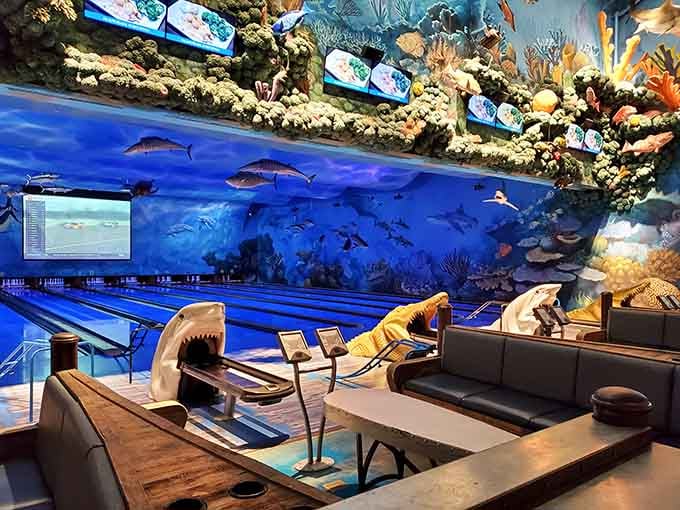 Leather seats, coral reef murals, and a shark sculpture at the lane, every seat here comes with a free side of wonder.