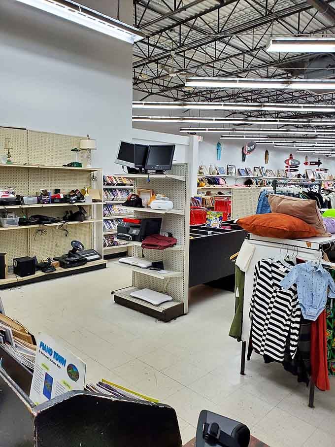 Electronics, pillows, books, and clothing all sharing the same zip code, organized chaos at its absolute finest.
