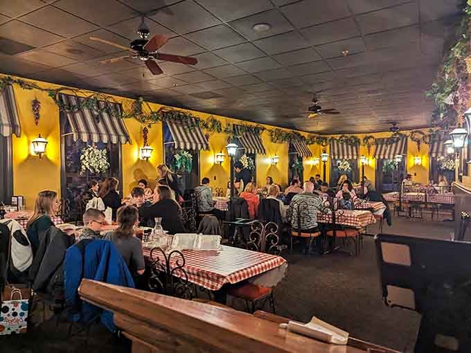Dining room filled with happy guests enjoying generous portions and even more generous hospitality.