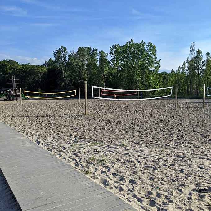 Beach volleyball courts ready for action, because competitive fun never goes out of style.