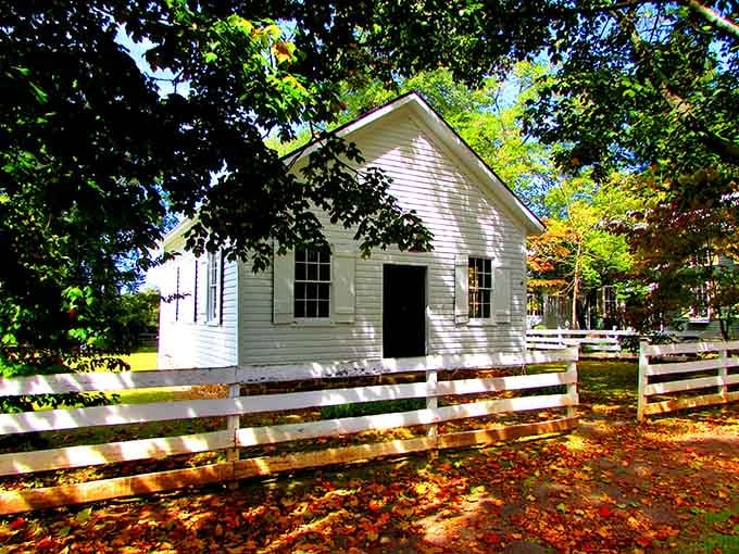 This little white schoolhouse, surrounded by fall leaves, is the kind of place that makes you want to sit down and learn something.