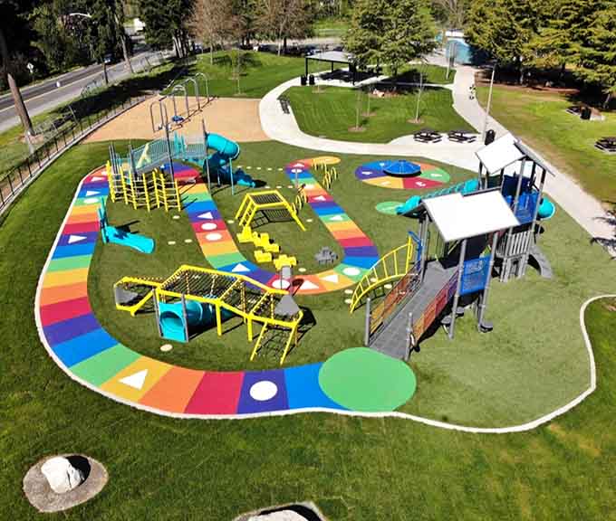 Bright rainbow pathways and exciting structures await your next sunny day adventure, offering endless colorful fun for your whole family.