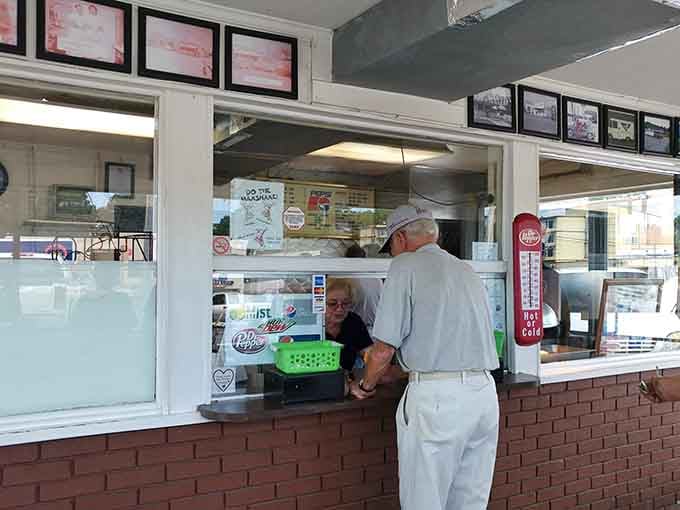 Real people enjoying real food at a real American institution, no Instagram filters needed for this experience.