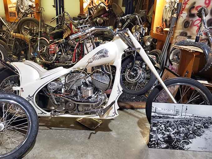 That white chopper with its exposed chrome engine and ornate frame details is the kind of build that makes you stop mid-sentence.
