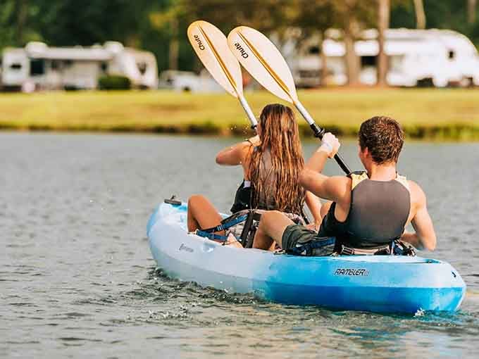 Paddling across a glassy lake with RVs dotting the shore, this is the kind of afternoon that resets everything.