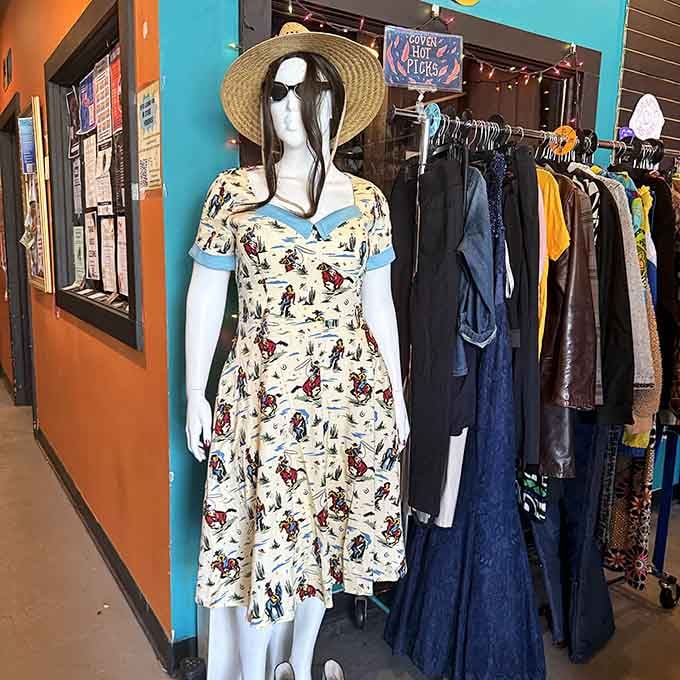 A vintage-style swing dress on a mannequin that's honestly better dressed than most people heading out on a Saturday night.