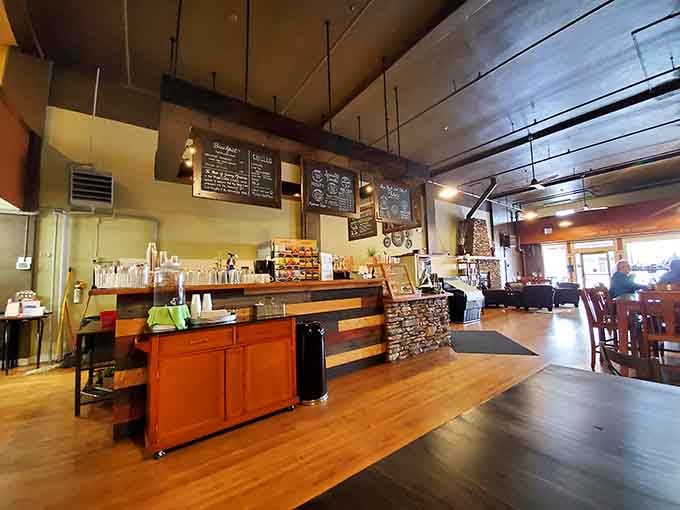 Phileo's Coffee and Eatery has warm wood tones, chalkboard menus, and the kind of atmosphere that makes you want to stay for a second cup.