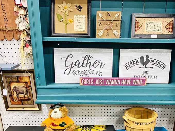 Wooden signs that say "Gather" and "Girls Just Wanna Have Wine," because honestly, both are solid life philosophies.