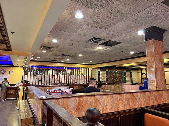 Warm lighting, comfortable booths, and marble-toned columns. Yoki Buffet's dining room feels welcoming from the very first glance.