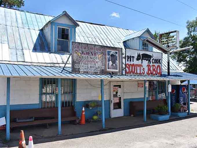 A weathered blue porch, hand-painted signs, and a heartfelt tribute banner make Scott's Bar-B-Que one of the most soulful storefronts in South Carolina.