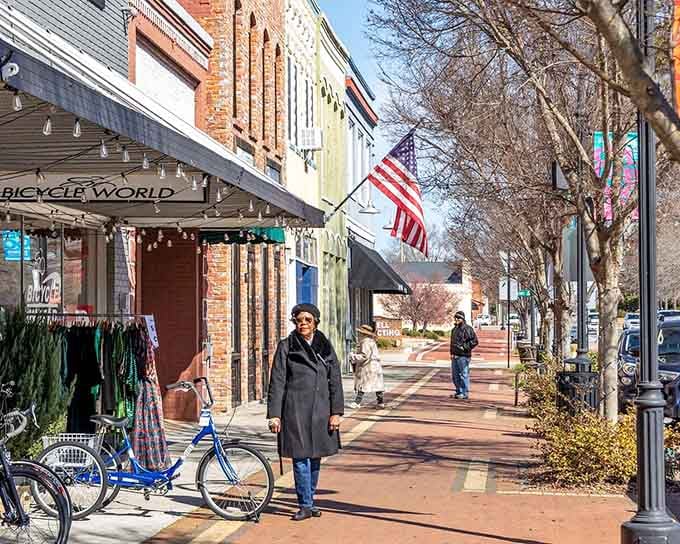 Bicycle World, an American flag, and warm winter sunshine - Goldsboro's sidewalks have a welcoming energy all their own.