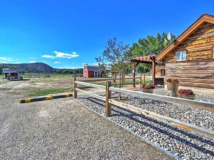 Gravel parking and wooden fencing frame your arrival at a place where stress goes to die peacefully.