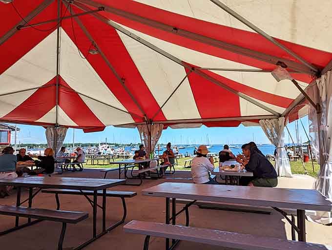 Sitting under the red and white tent with the harbor right in front of you is honestly one of Connecticut's finest simple pleasures.