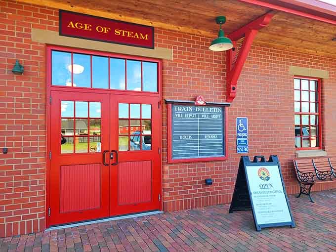 Those red doors at the Age of Steam ticket office say "come on in" without uttering a single word.