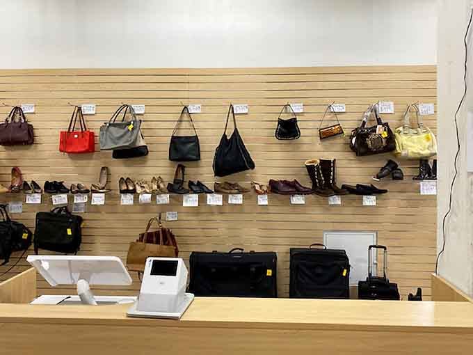 Handbags, shoes, and luggage displayed neatly at the checkout area, a final temptation before you think you're done shopping.