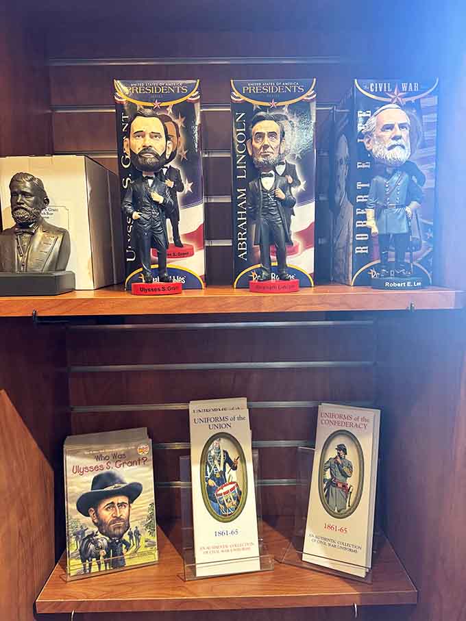 Grant, Lincoln, and Lee bobbleheads sharing a shelf together, proof that history has a sense of humor after all.