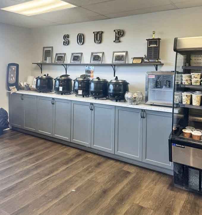 A dedicated soup station with multiple warmers and the word SOUP spelled out on the wall, subtle it is not, delicious it certainly is.