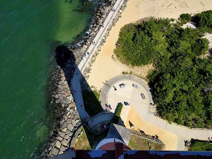 Looking straight down from 172 feet up, the world below suddenly looks very small and very, very far away. Worth every single step.