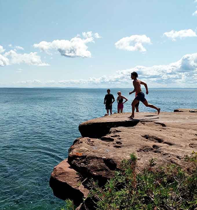 That sandstone ledge over Lake Superior has been calling to brave souls for generations. Today is your turn.
