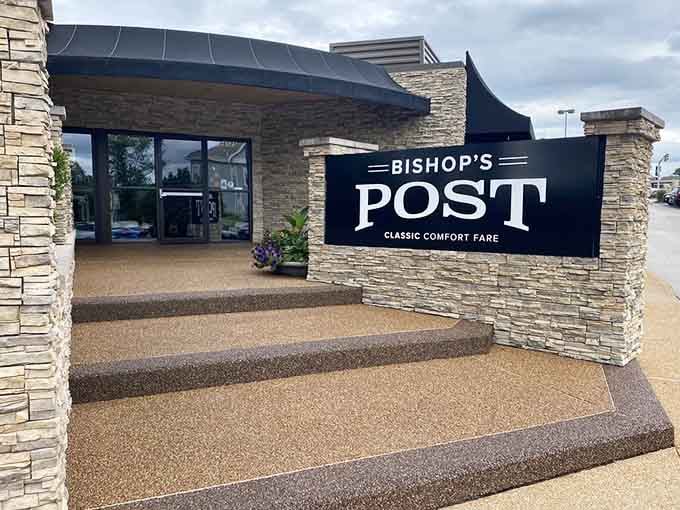 Stone steps, bold signage, and a clean entrance that sets the tone before you even walk through the door.