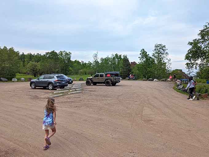 The gravel lot is simple, the beach waiting just beyond it is anything but ordinary.