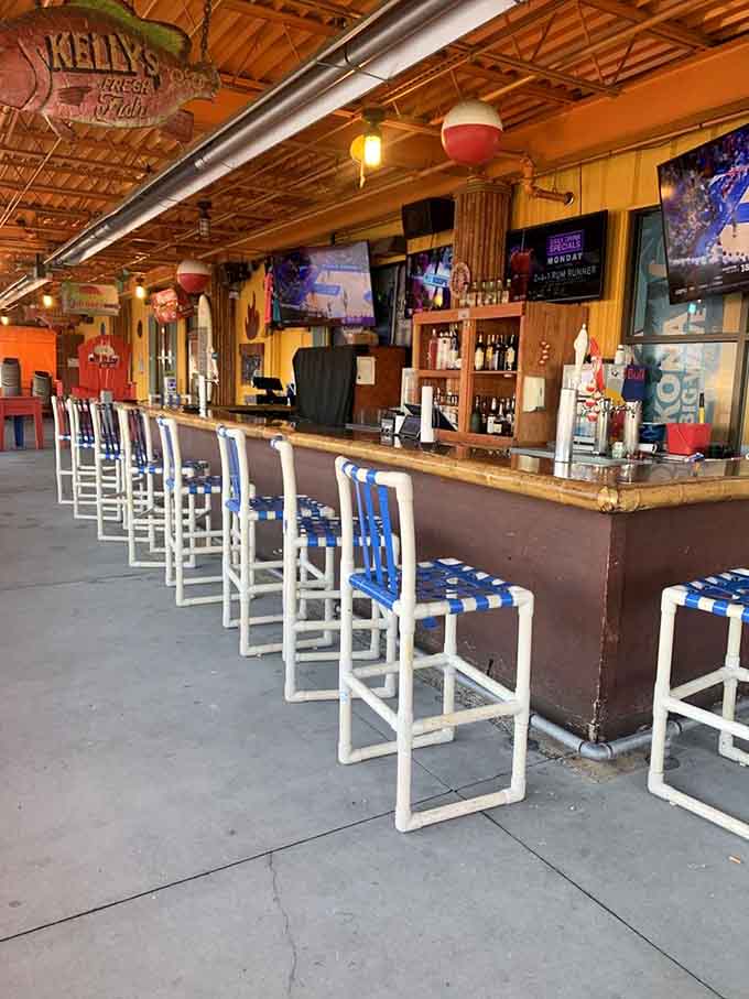 The bar stretches out invitingly, ready to mix up whatever tropical concoction will transport you far from reality.