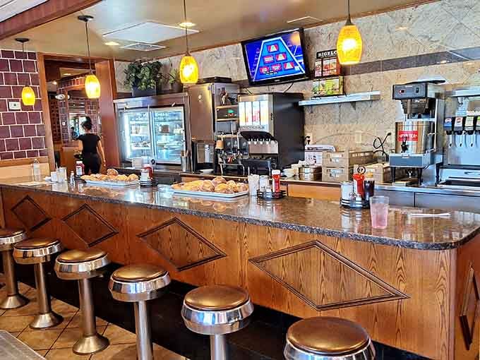 Classic counter stools, fresh pastries on display, and coffee always within reach, this is diner perfection.