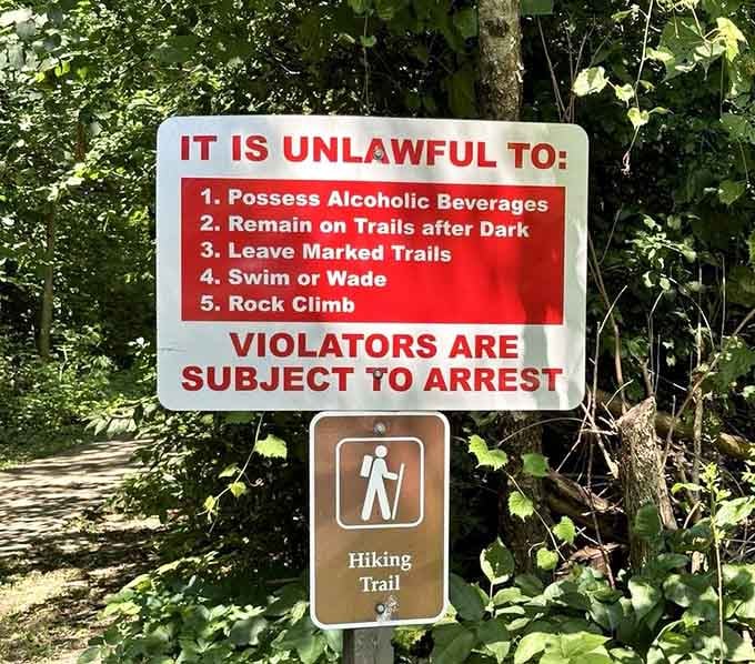Park rules keeping everyone safe and honest, though "no rock climbing" seems oddly specific for good reason here.