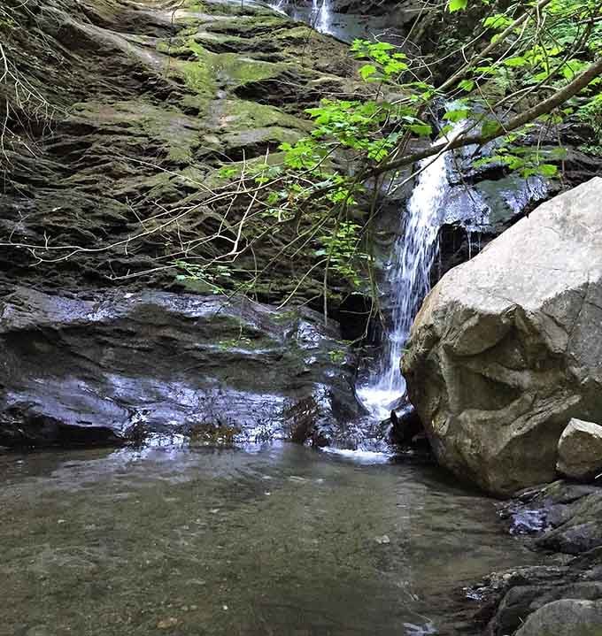 Sitting inside this gorge with water trickling past your feet, you'll wonder why you ever needed a fancy vacation destination.