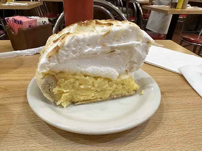 A towering slice of lemon meringue pie with a cloud of toasted meringue, this dessert is genuinely worth saving room for.
