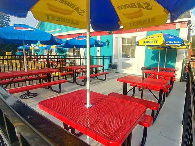 Red picnic tables, colorful umbrellas, and fresh air. The outdoor patio makes a great meal even better somehow.