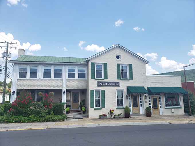 The Red Lantern Inn sits pretty with flower boxes and green shutters. Charm like this doesn't need a filter.