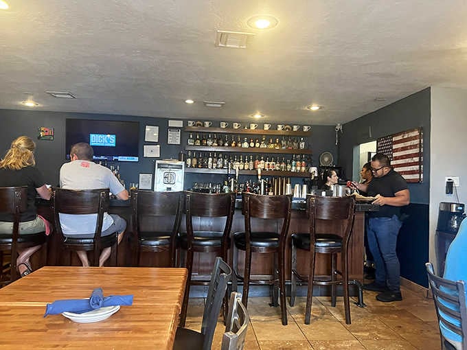 A well-stocked bar, dark walls, and a relaxed crowd — the tequila selection here means you'll be staying a while.