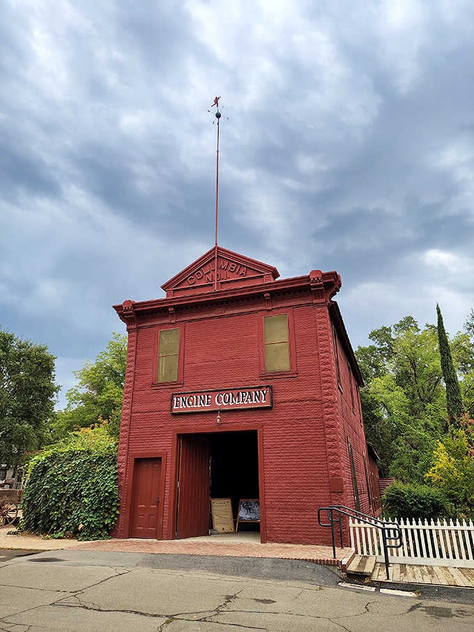 The Columbia Engine Company firehouse stands like a proud sentinel, its weather vane still spinning stories into the Sierra Nevada sky.