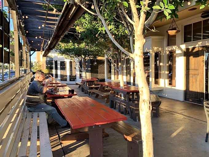 String lights and picnic tables under the stars make outdoor dining feel like a perpetual summer celebration.