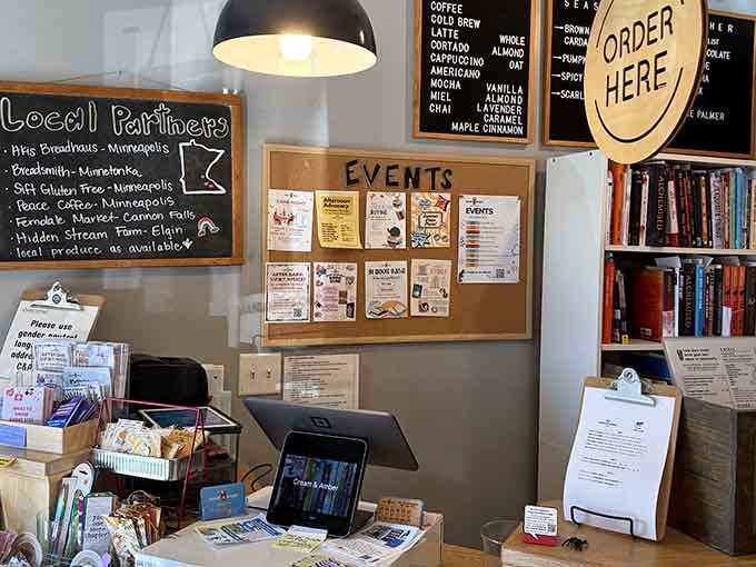 Local partners listed proudly on a chalkboard, events pinned up, and an order counter that means business. Community isn't just a buzzword here.