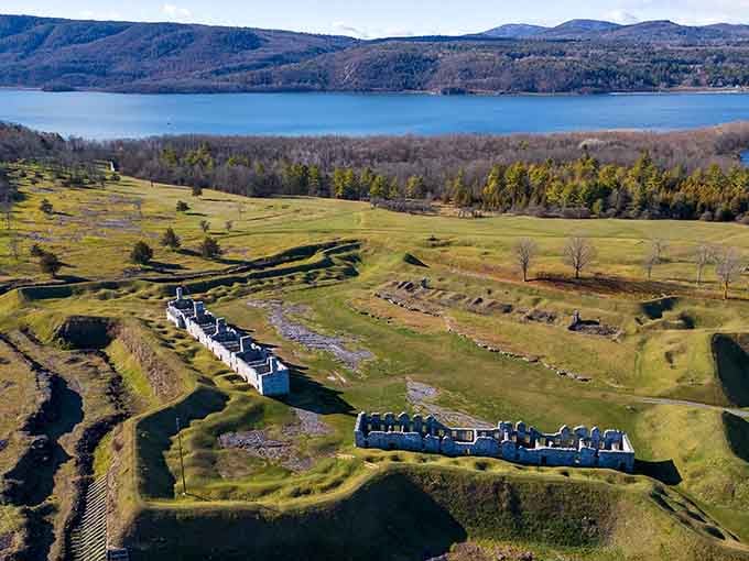 From above, the full scale of Crown Point reveals itself, a breathtaking patchwork of history, earthworks, and shimmering lake.