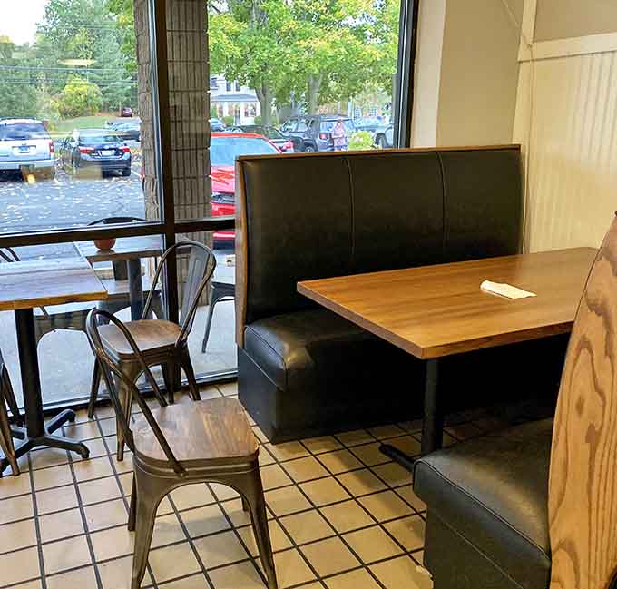 Window-side booths where you can watch the world go by while savoring seafood that tastes like coastal vacation.